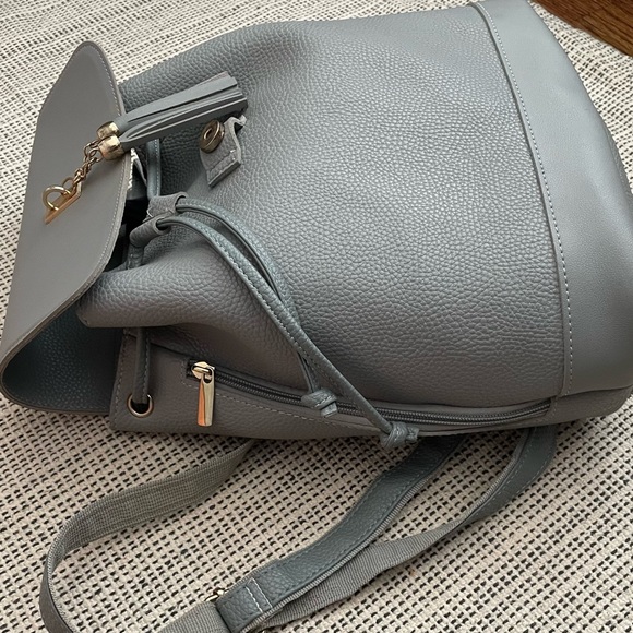 unbranded | Bags | Nwot Faux Leather Backpack With Tassel And Gold ...